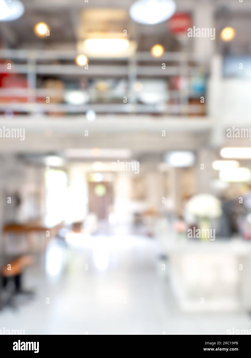 Abstract blurred modern white cafe workspace background, two storey ...