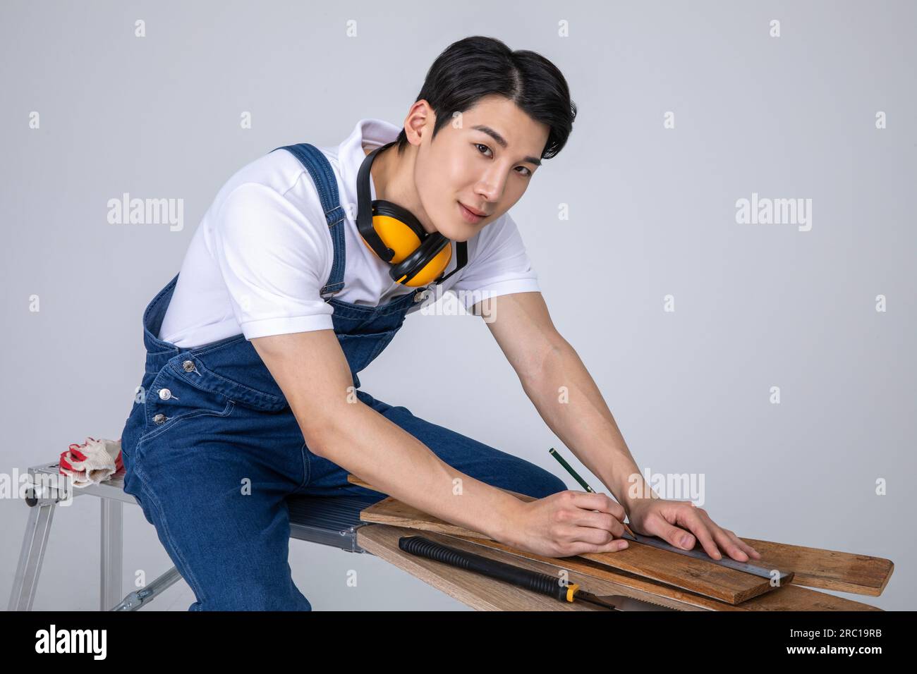 millennials and gen z, korean asian young man carpenter sitting and ...