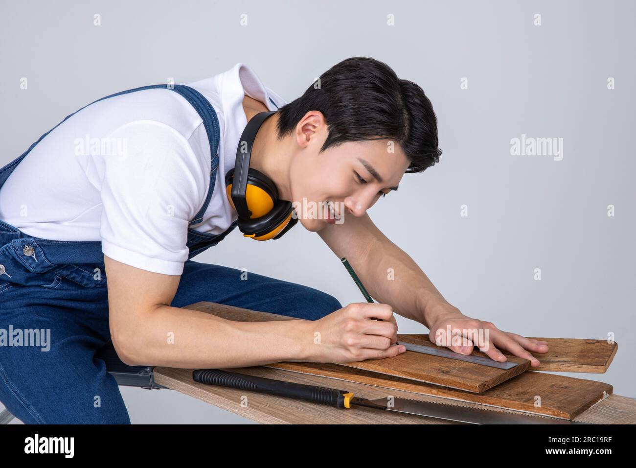 millennials and gen z, korean asian young man carpenter sitting and ...