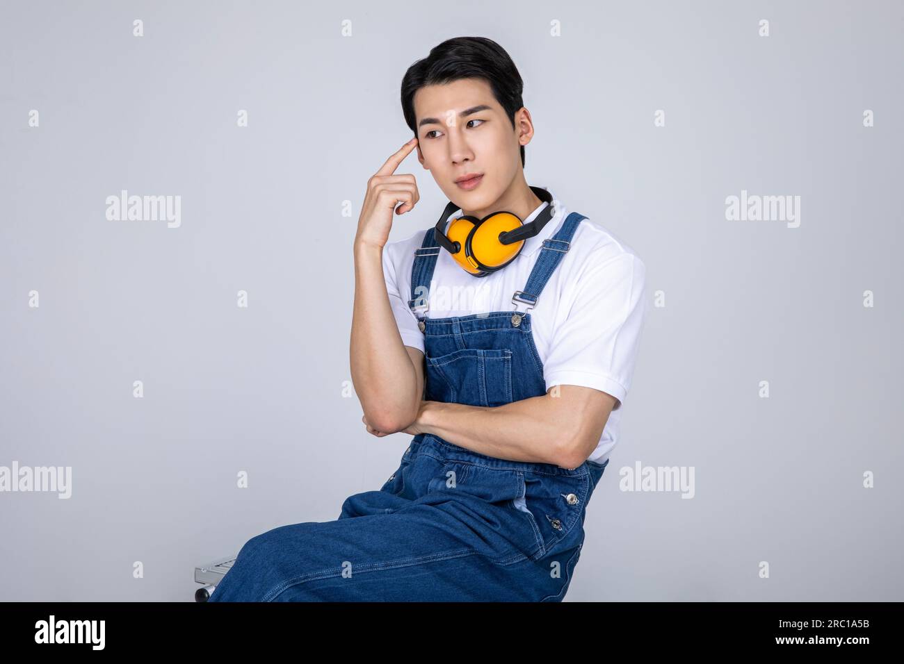 millennials and gen z, korean asian young man carpenter sitting and ...