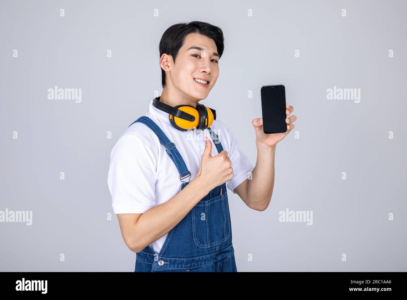 millennials and gen z, korean asian young man carpenter holding ...
