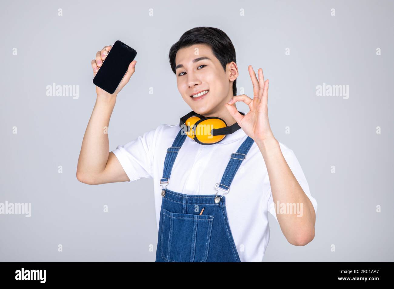 millennials and gen z, korean asian young man carpenter with a ...