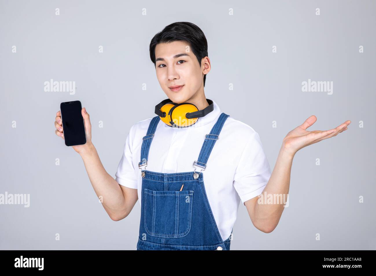 millennials and gen z, korean asian young man carpenter with a ...