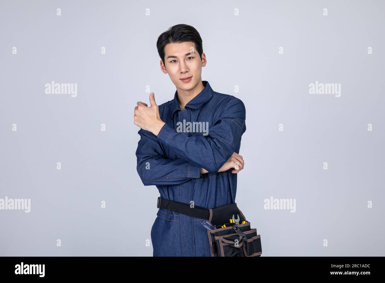 millennials and gen z, korean asian young man, site staff standing ...