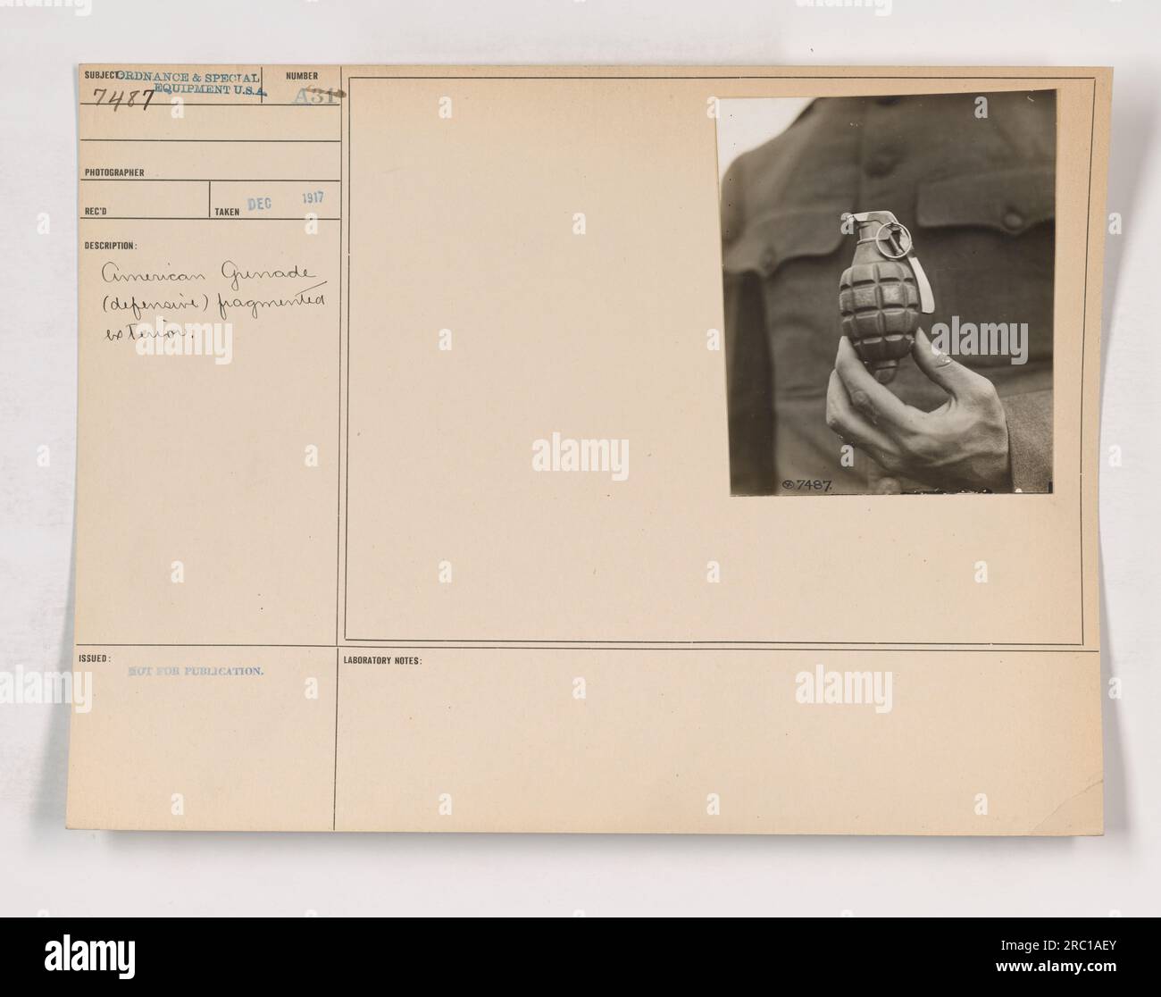 American grenade (defensive) shown in fragmented state. This photo ...