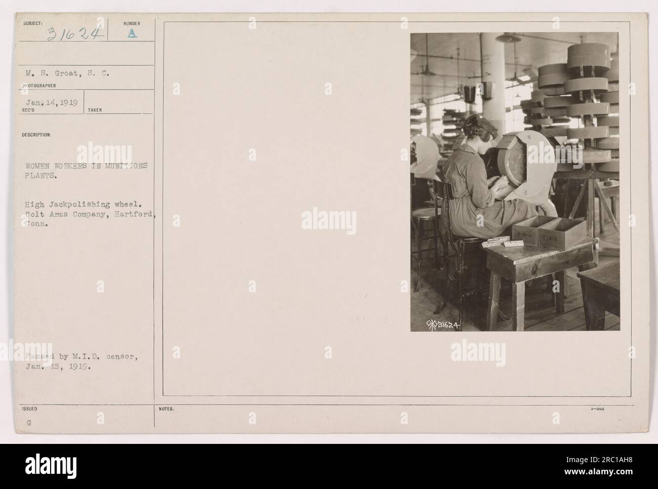 Image depicting women workers in a munitions plant. The photo shows a ...