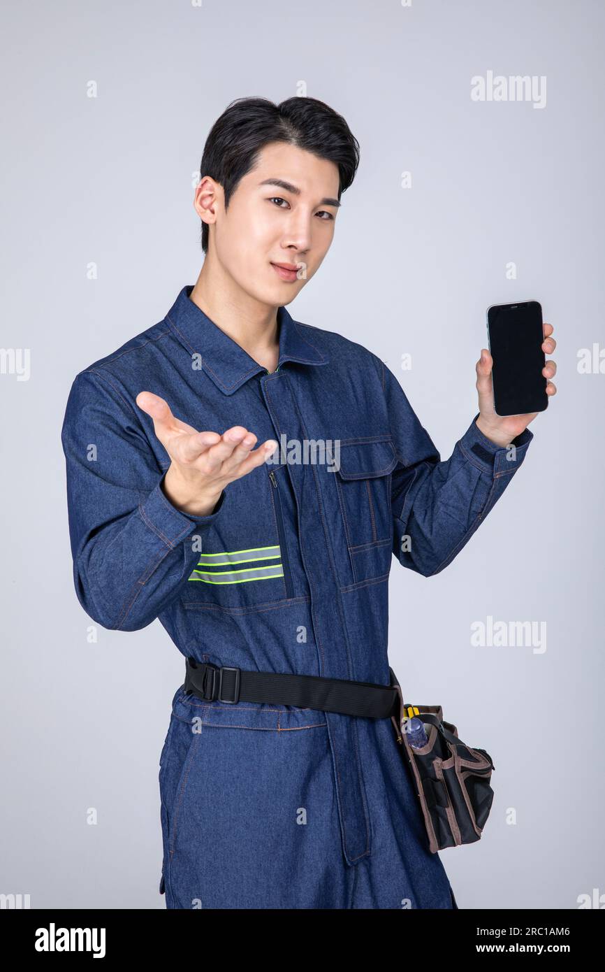 millennials and gen z, korean asian young man, site staff with a ...