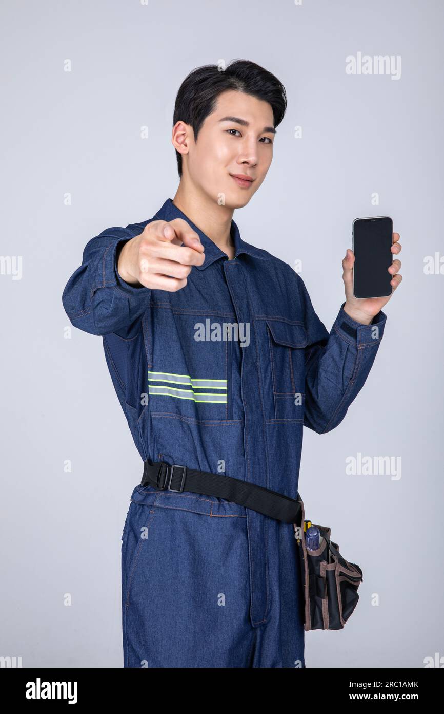 millennials and gen z, korean asian young man, site staff with a ...