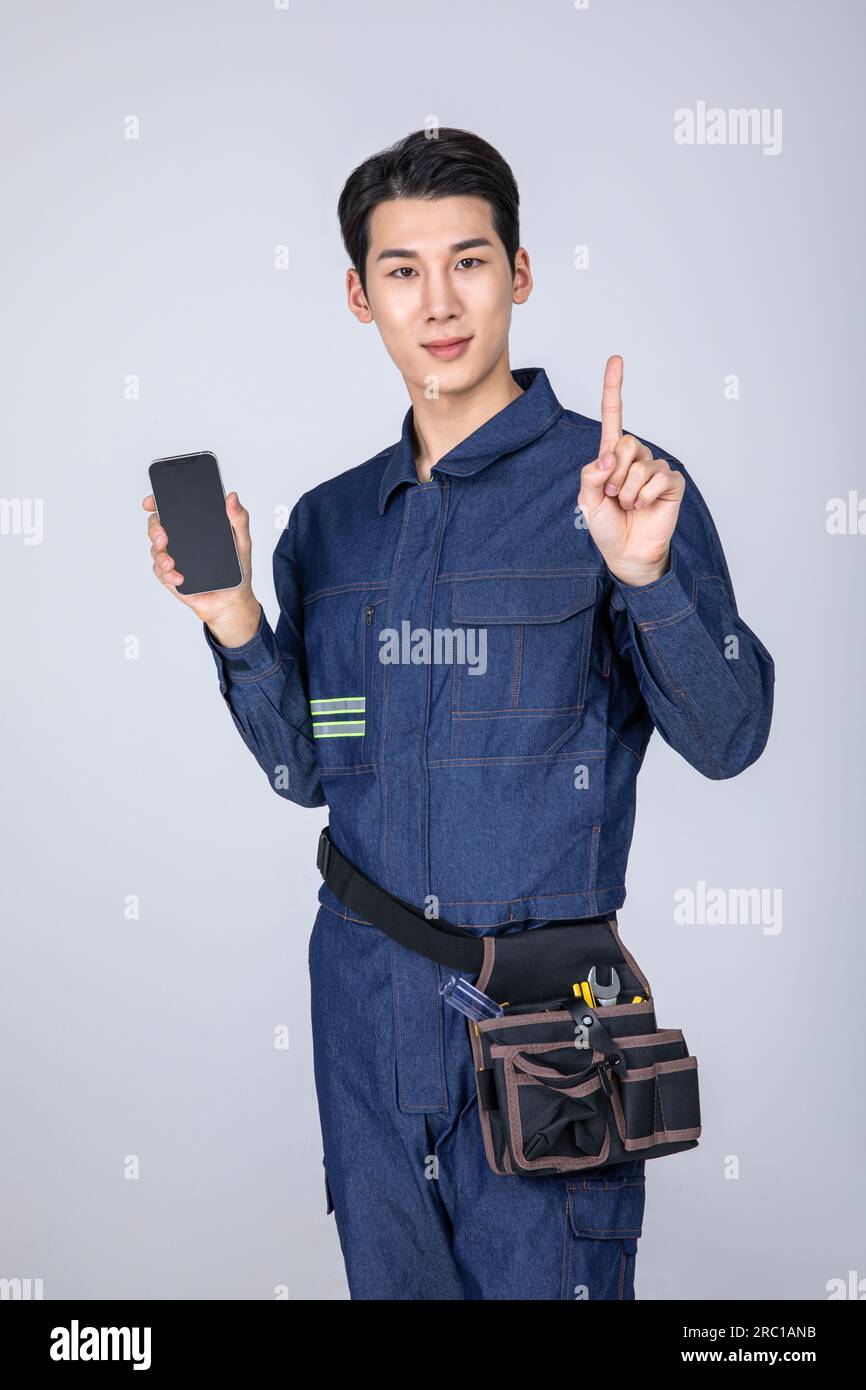 millennials and gen z, korean asian young man, site staff with a ...