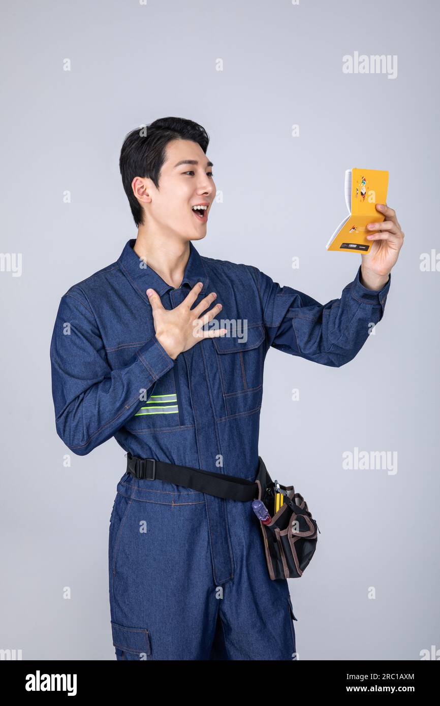 millennials and gen z, korean asian young man, site staff checking a ...