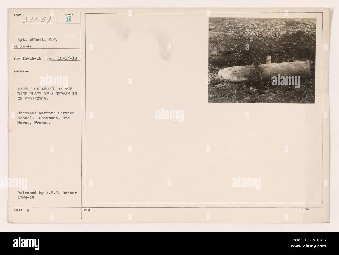 Soldier inspecting the damage caused by the recoil of a German 18 cm ...