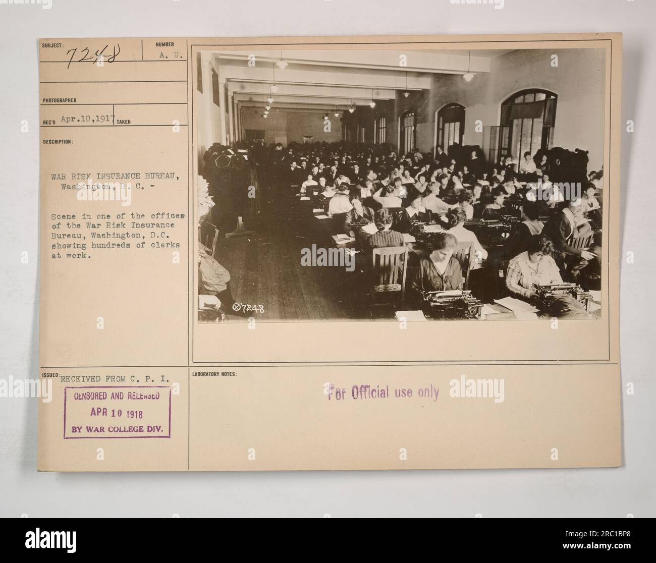 "Image depicts a scene in one of the offices of the War Risk Insurance ...