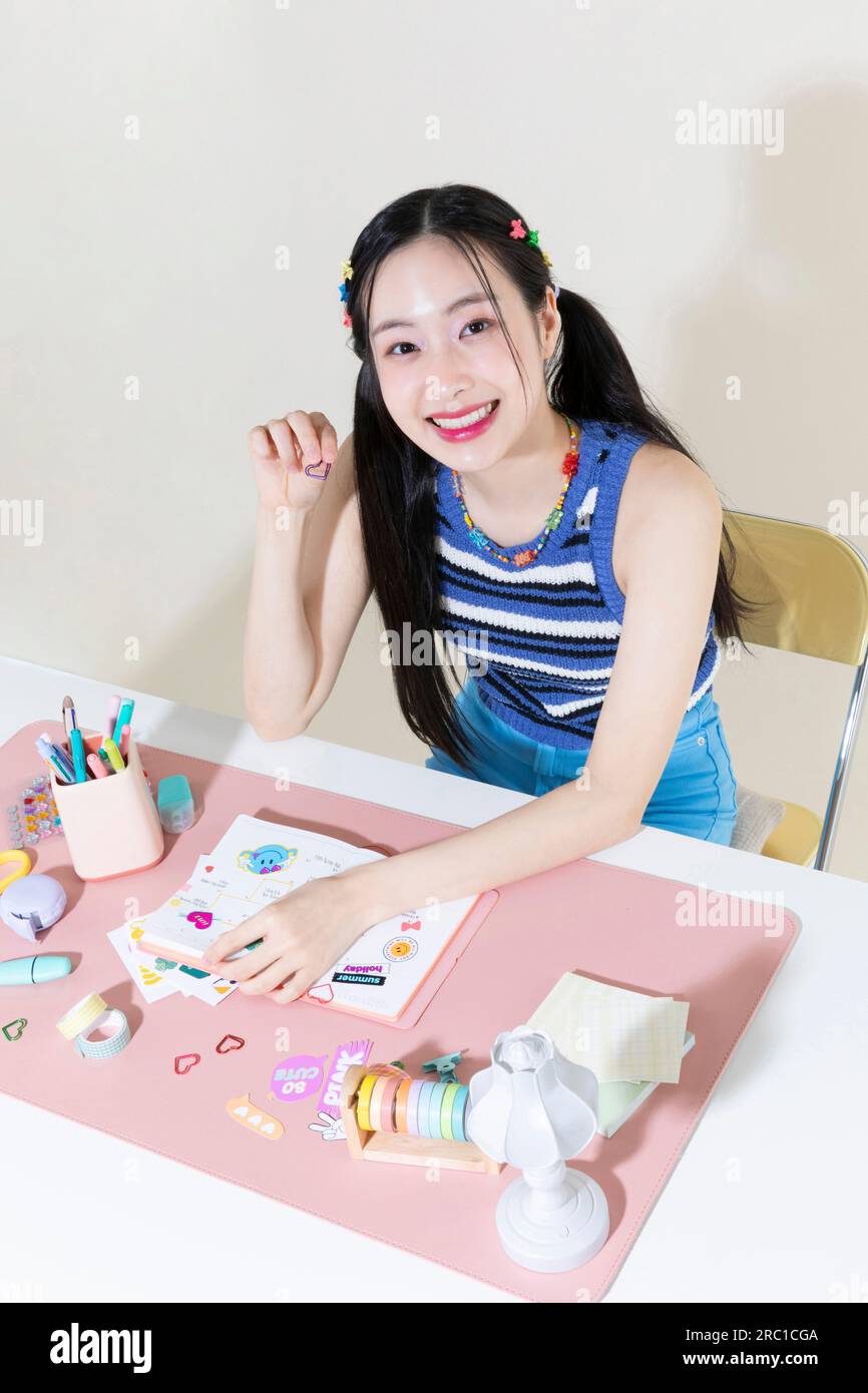 vintage y2k retro concept photo of korean asian cute woman decorating ...
