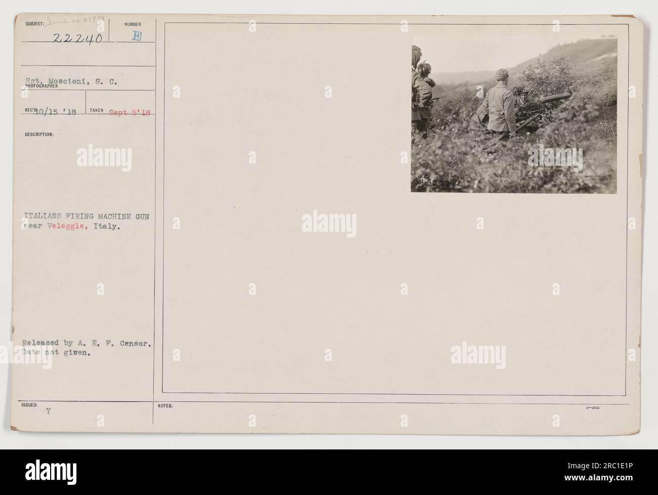 Italian soldiers firing a machine gun near Veleggle, Italy during World ...