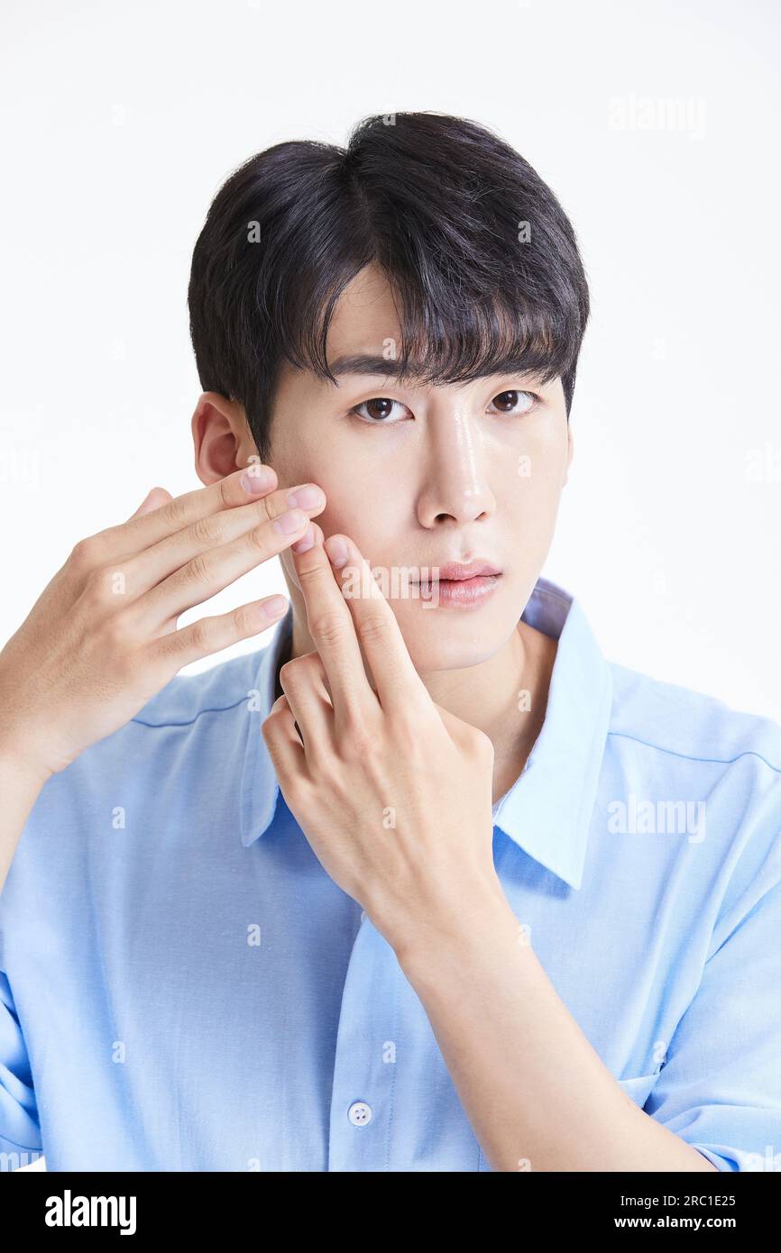 korean asian young man with skin concerns Stock Photo - Alamy
