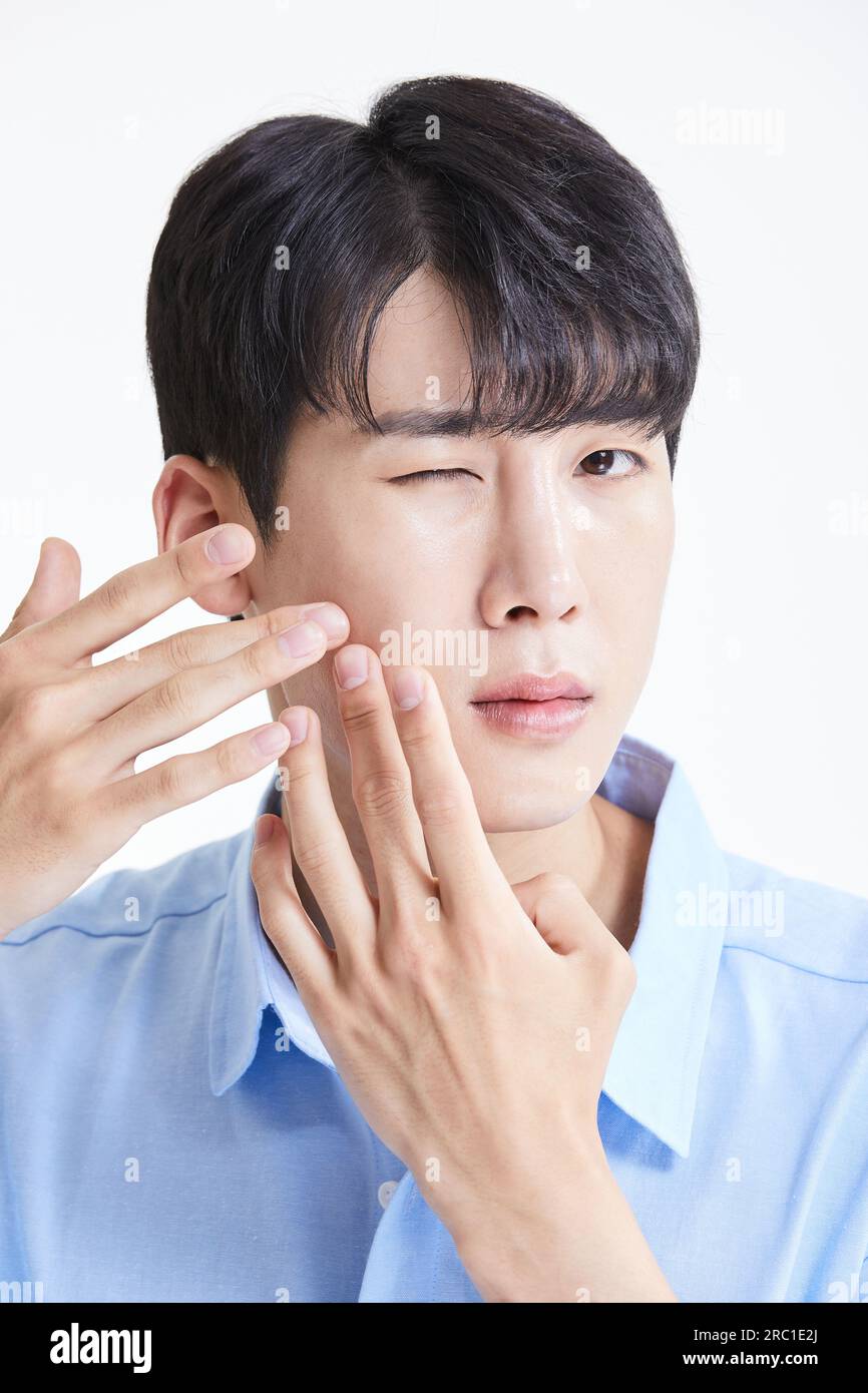 korean asian young man with skin concerns Stock Photo - Alamy
