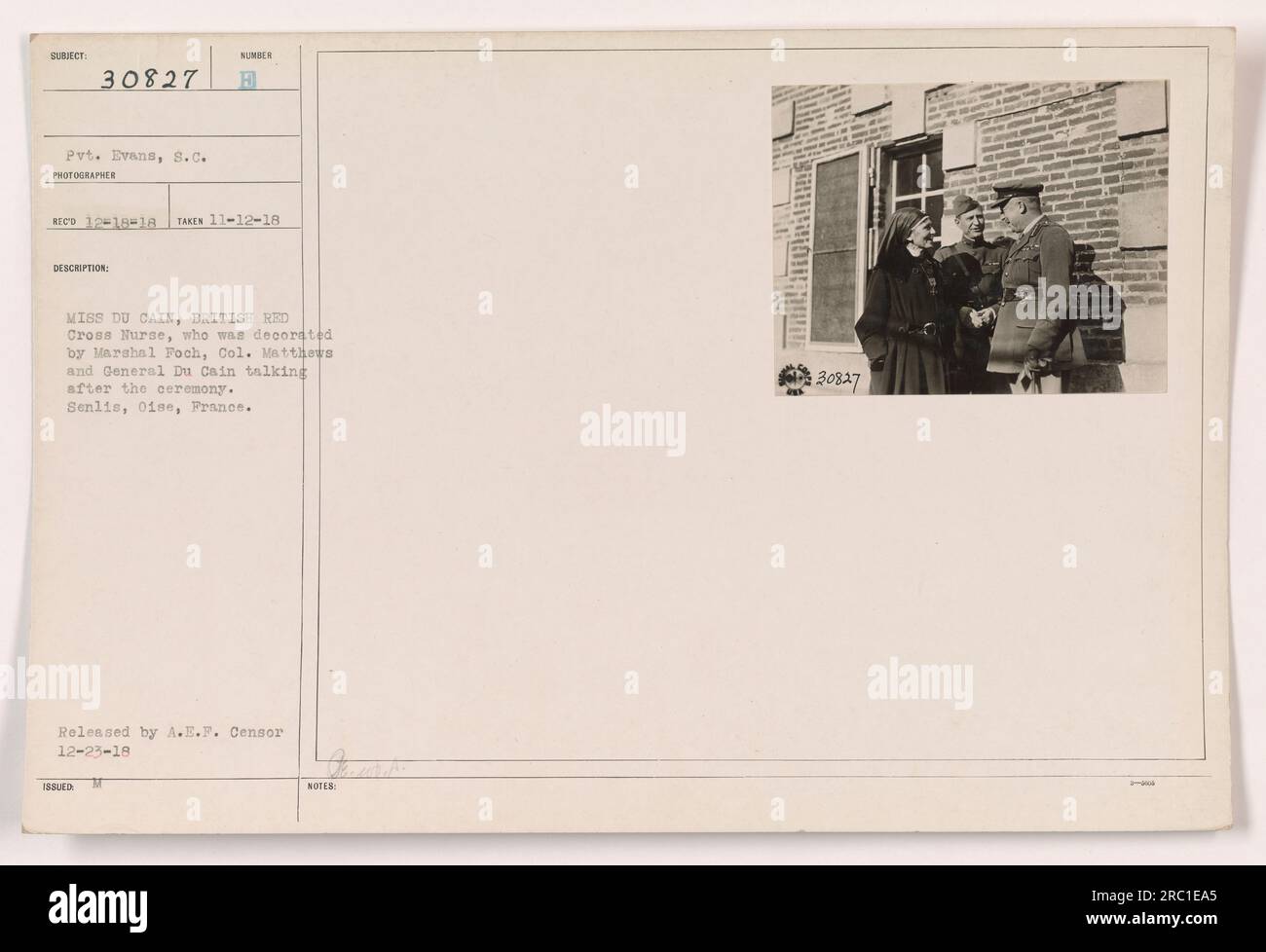 British Red Cross Nurse, Miss Du Cain, is seen conversing with Col ...