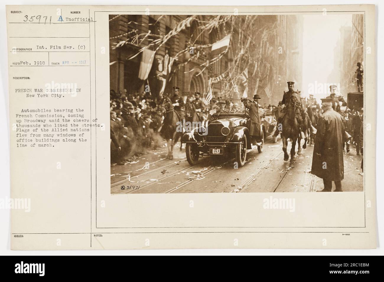 Cars carrying the French War Commission drive through the streets of ...