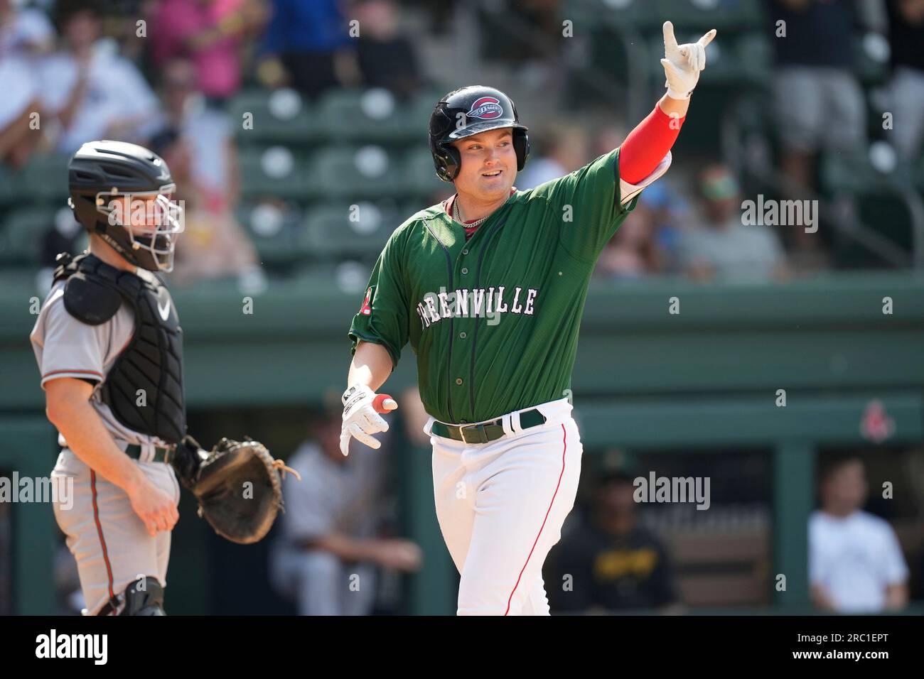 Third baseman Blaze Jordan (24) of the Greenville Drive gestures as he ...