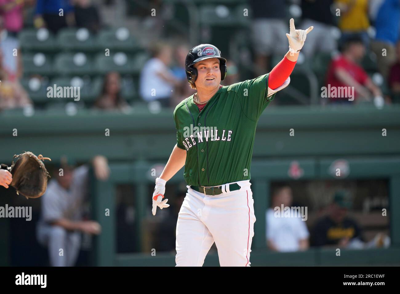 Third baseman Blaze Jordan (24) of the Greenville Drive gestures as he ...