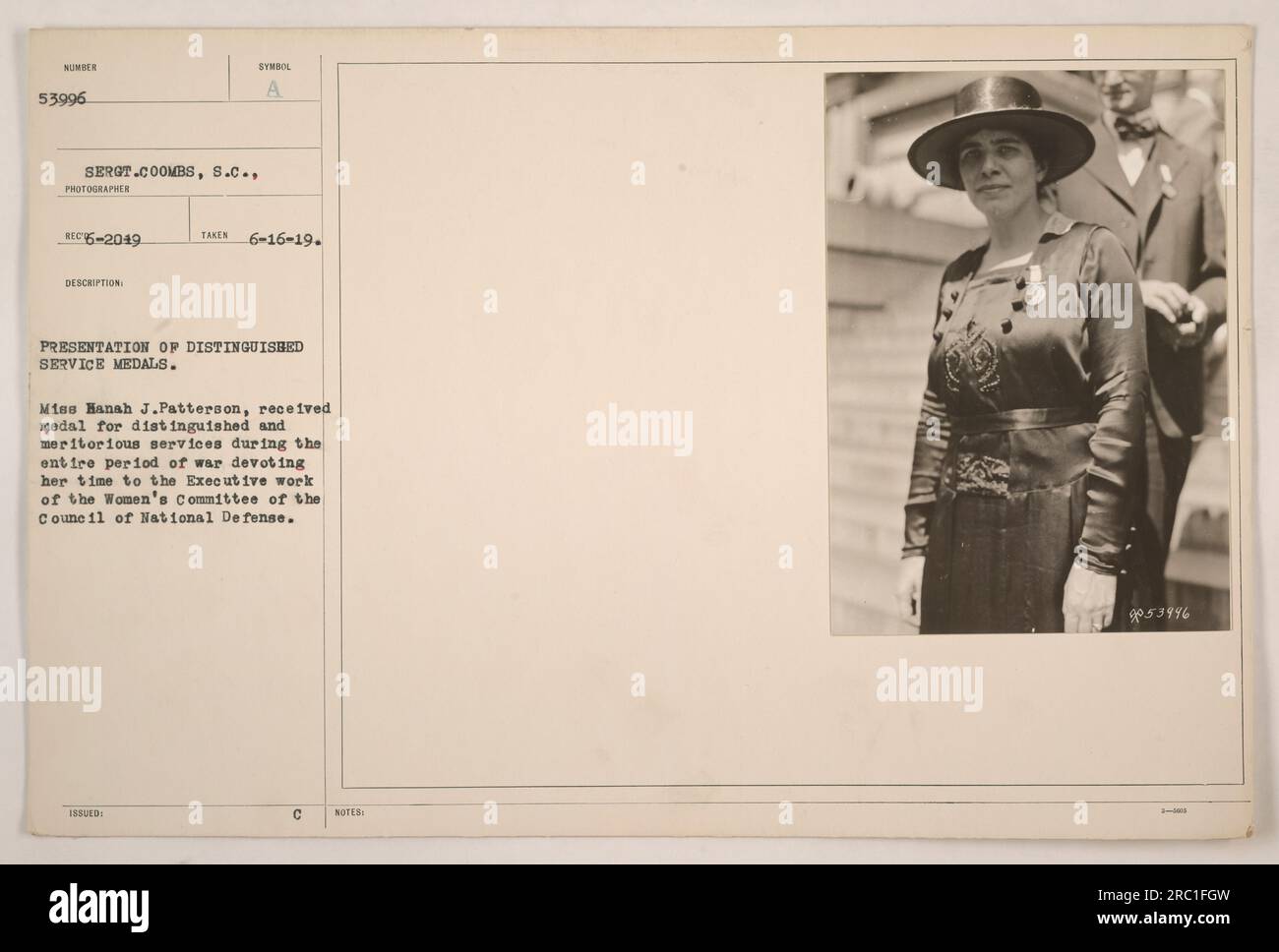 Image shows the presentation of Distinguished Service medals to ...