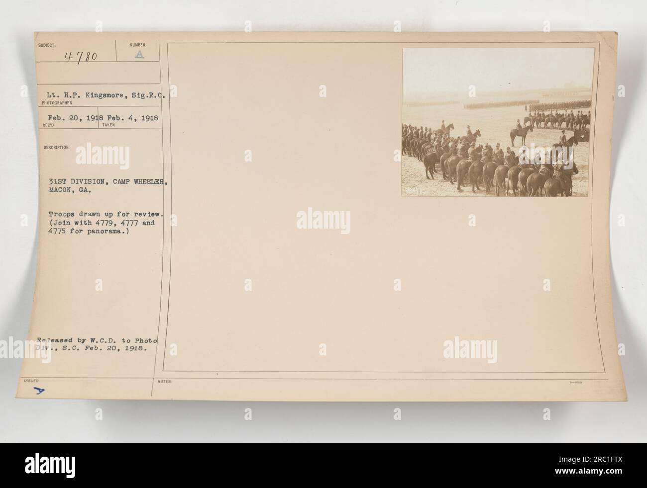 Troops from the 31st Division are seen standing in formation for a ...