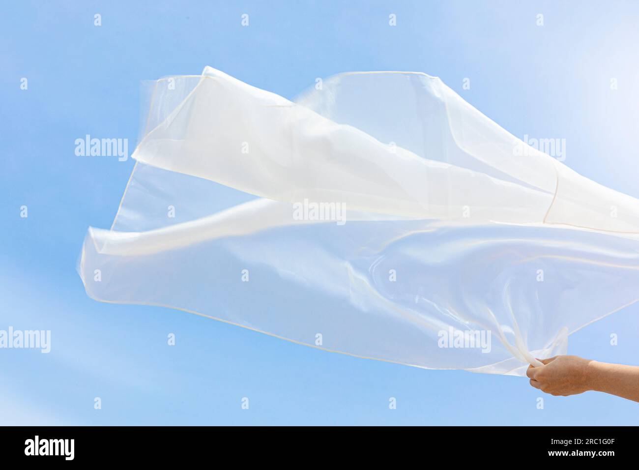 beautiful beach and fabric blowing in the wind Stock Photo - Alamy