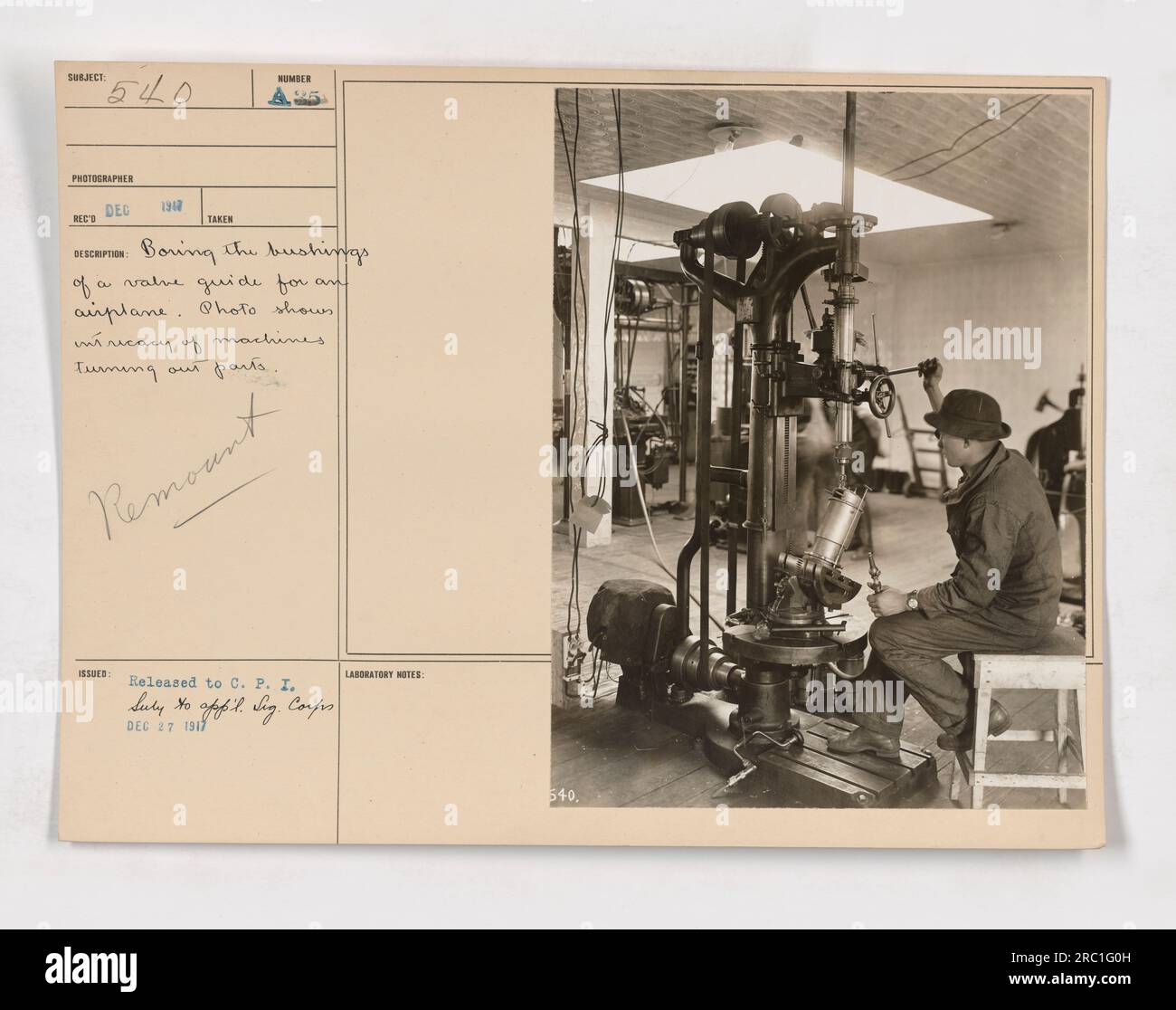 Machine turning out parts for airplane production. Image shows the ...