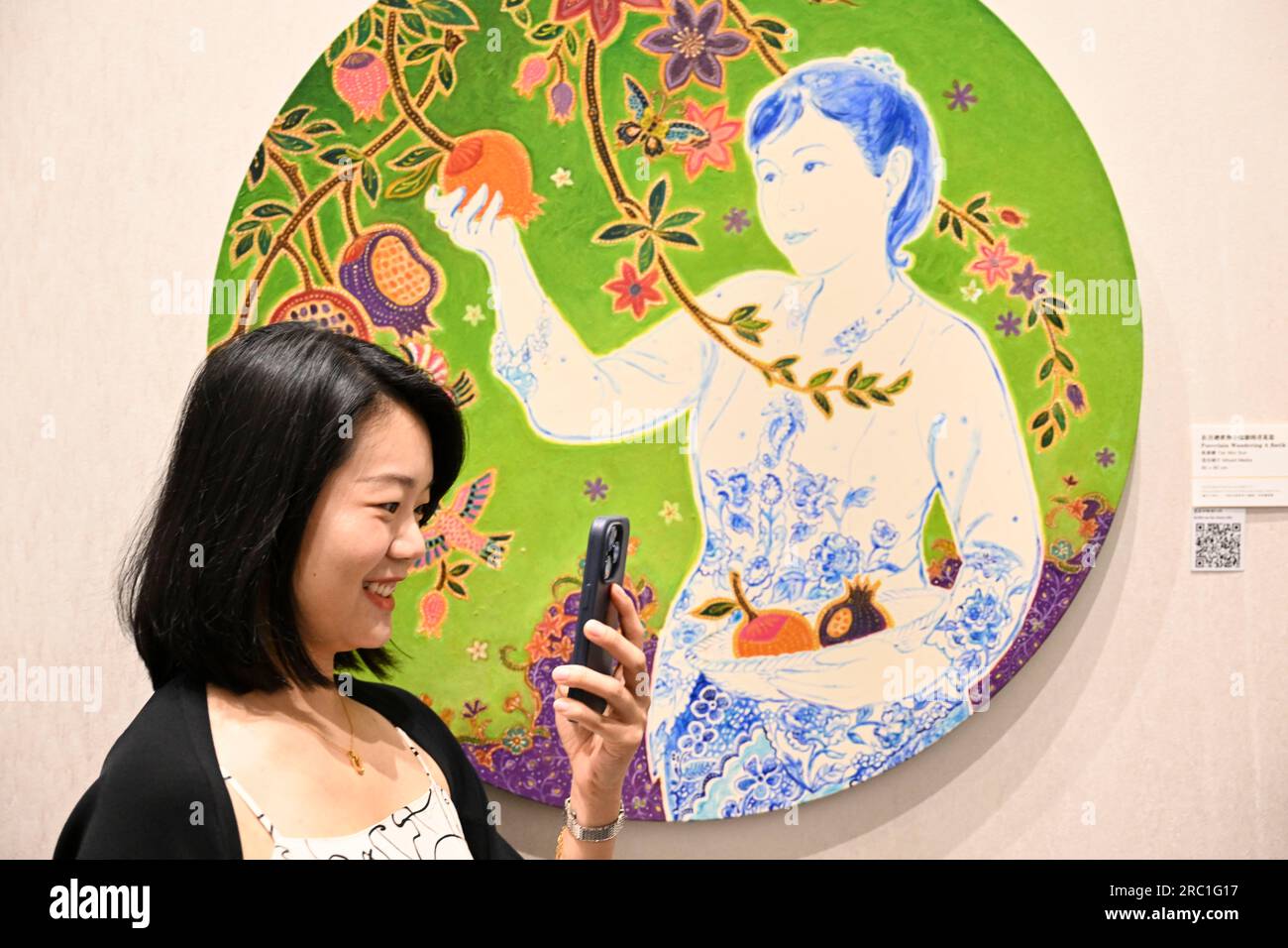 Kuala Lumpur, Malaysia. 11th July, 2023. A visitor takes photos with ...