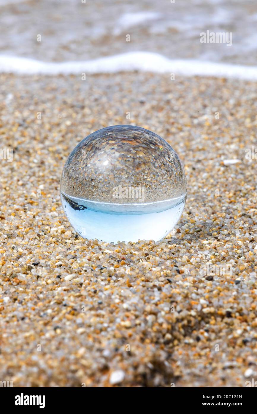 beautiful beach and glass ball Stock Photo - Alamy
