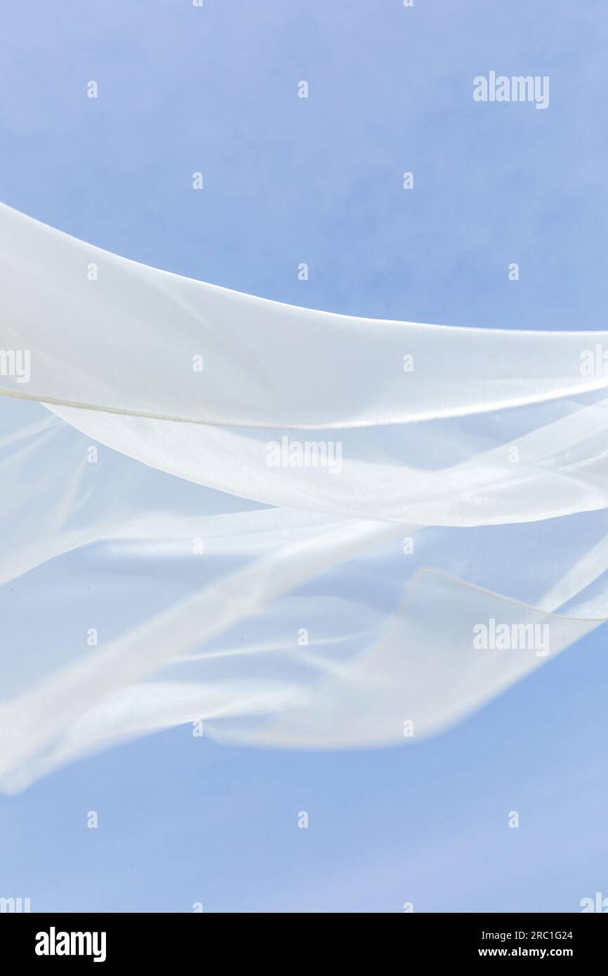 beautiful beach and fabric blowing in the wind Stock Photo - Alamy