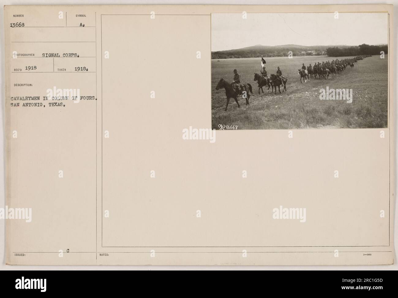 A group of cavalrymen in formation, known as a column of fours, during ...