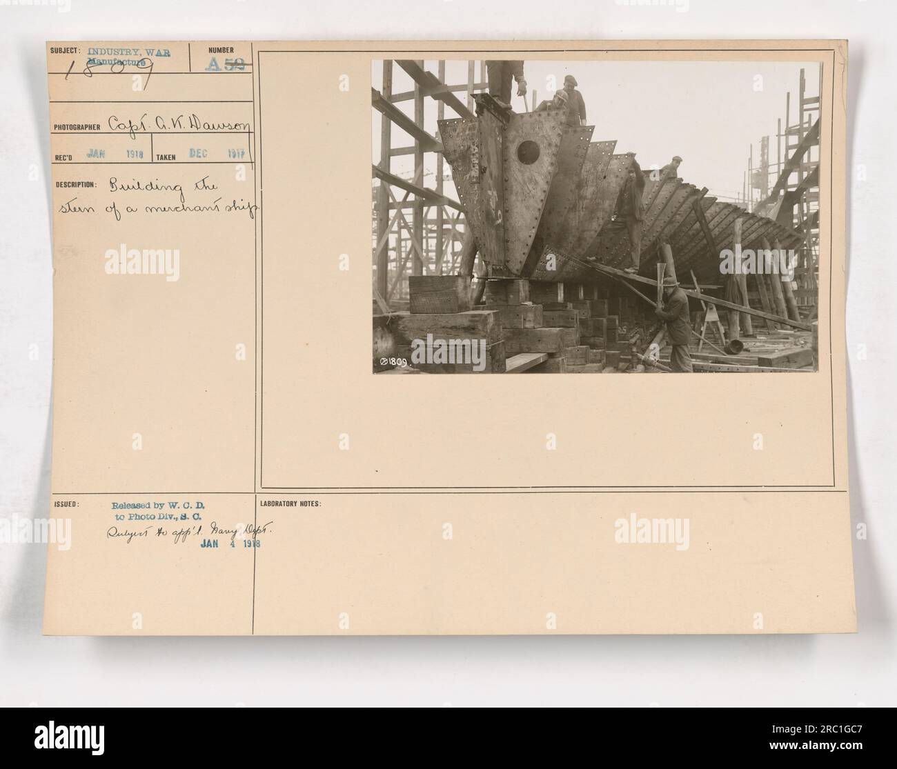 Workers constructing the stern of a merchant ship during World War One ...