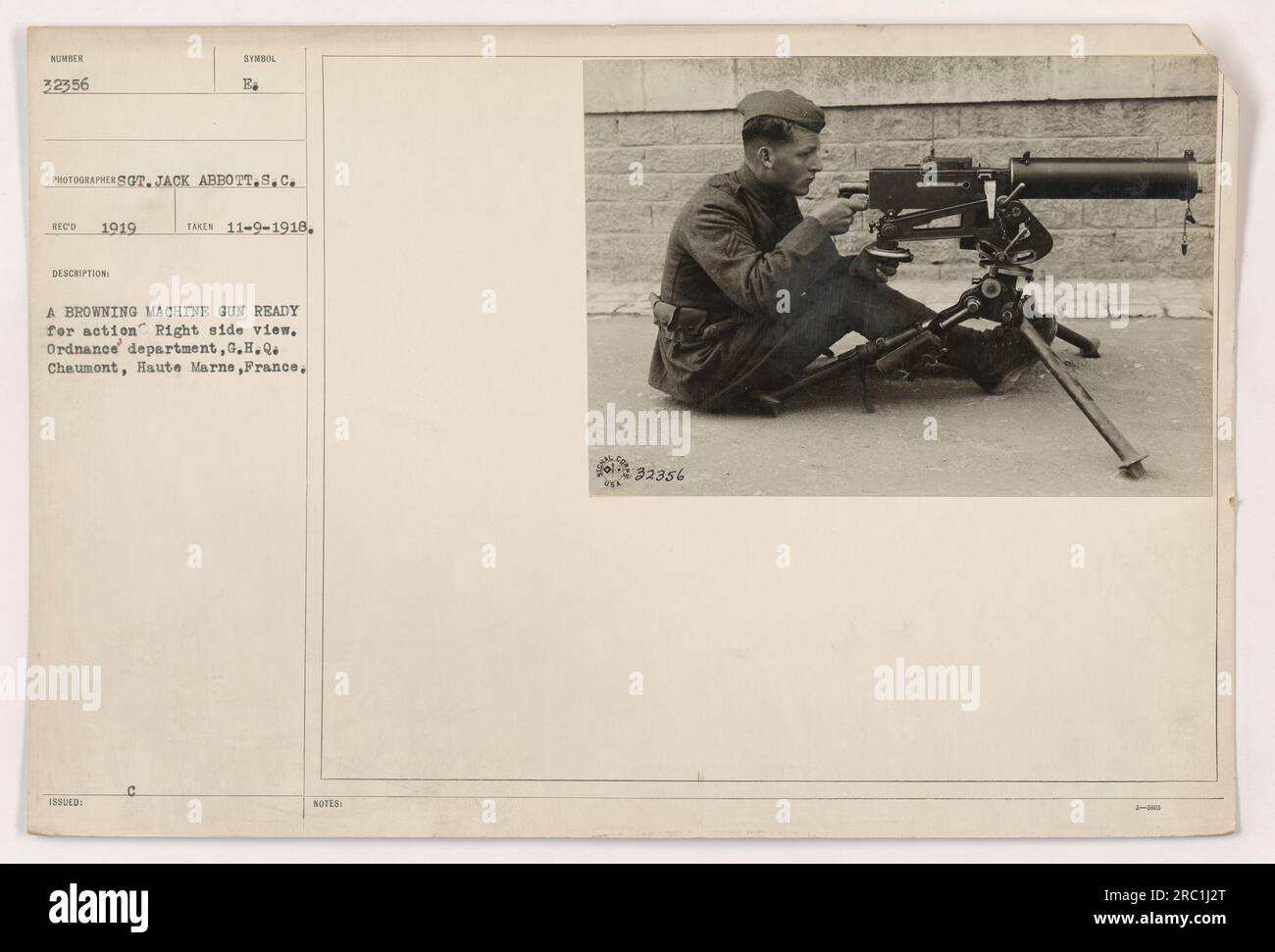 A Browning machine gun, ready for action, is seen in this photograph ...