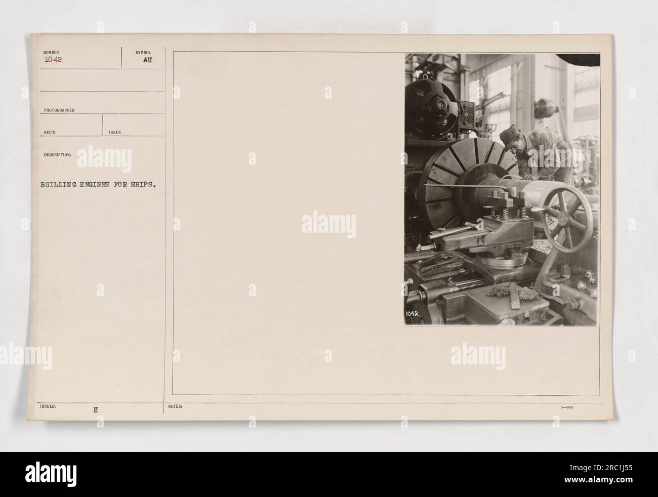 Crew members build engines for ships during World War One Stock Photo ...