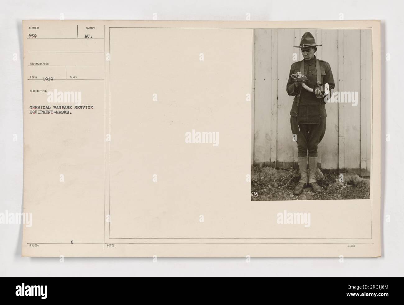 This photograph, taken in 1919, shows equipment masks used by the ...