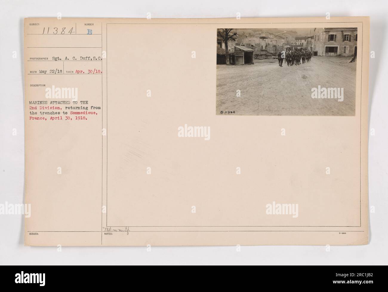 Marines attached to the 2nd Division, returning from the trenches to Sommedieu, France, on April ...