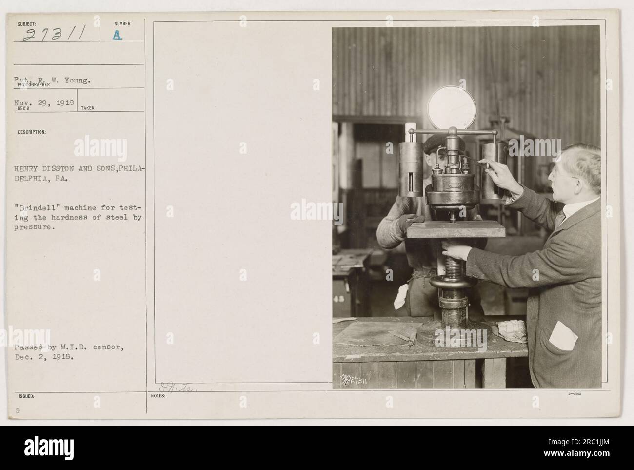 Private R. Young operating a "Brindell" machine at Henry Disston and ...