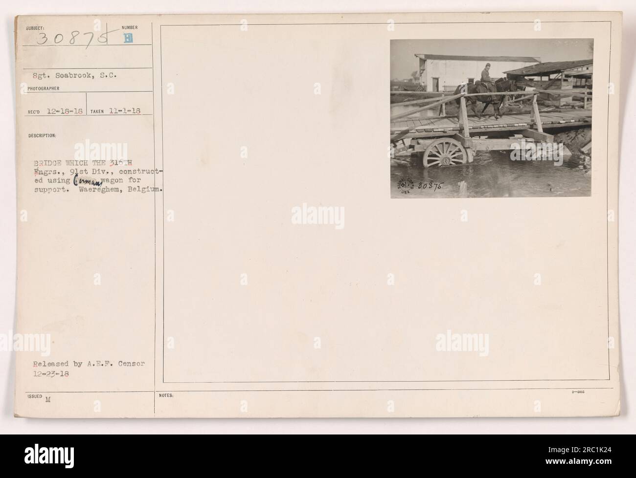 Soldier from the 316th Engineers of the 91st Division building a bridge ...