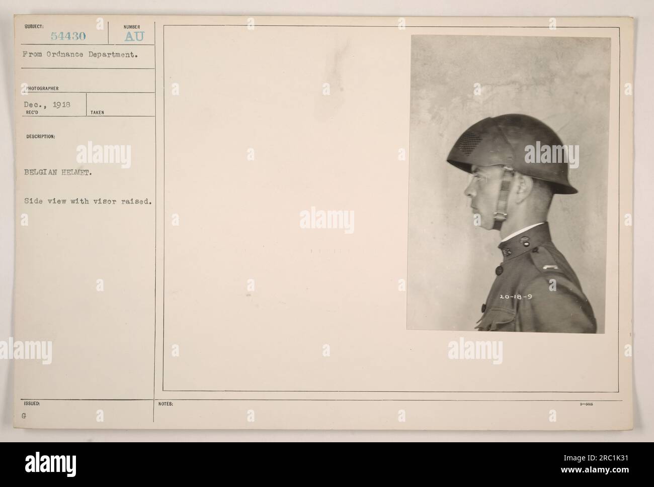 Belgian soldier wearing a helmet with the visor raised. The photograph ...