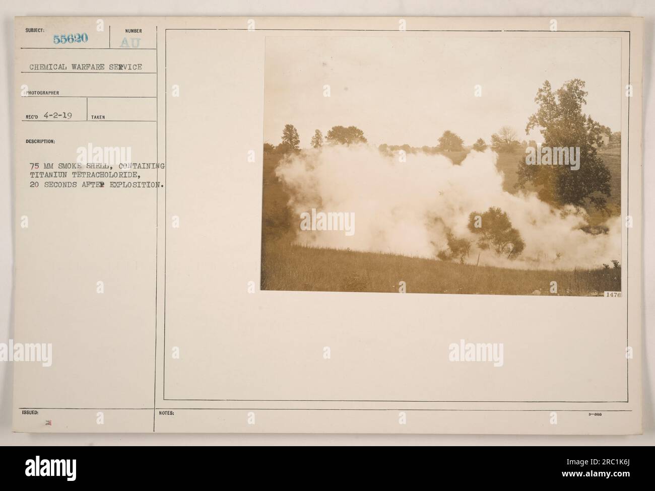 Photograph showing a 75 mm smoke shell containing titanium ...