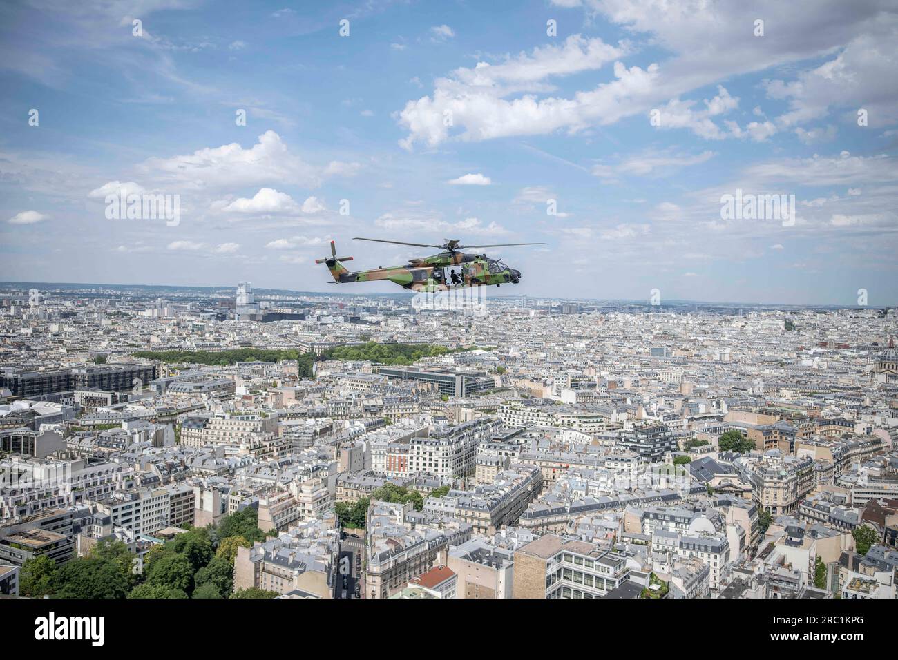 Paris, France. 11th July, 2023. A NH90 Caiman helicopter flies over ...