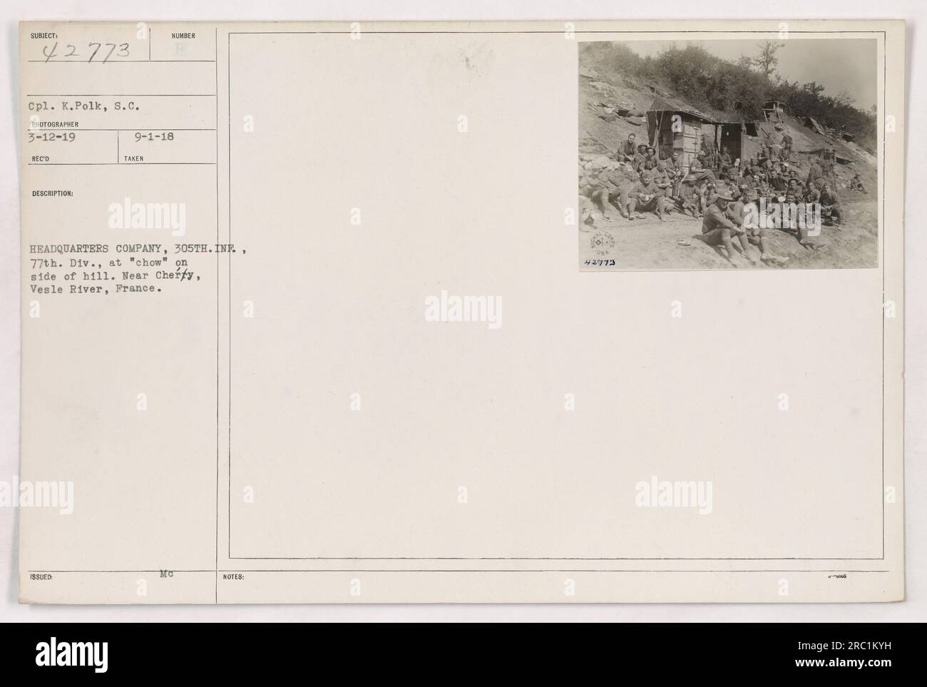Soldiers of Headquarters Company, 305th Infantry, 77th Division, take a ...