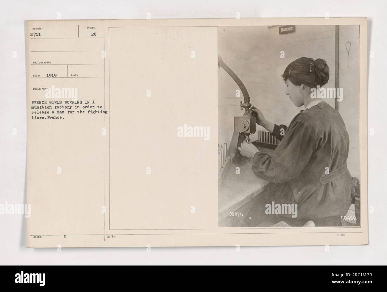 French girls working in a munition factory during World War One. They ...