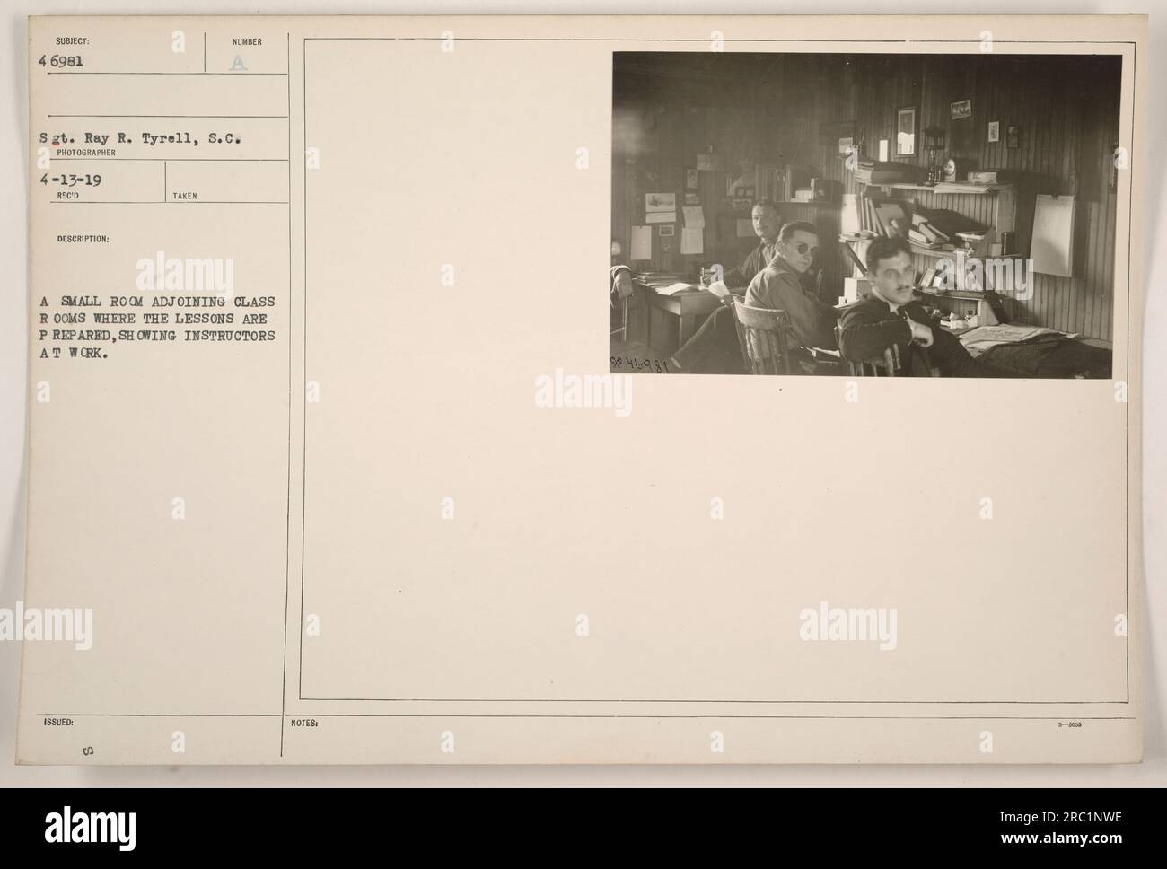 "Instructors in a small preparation room adjacent to the classrooms ...