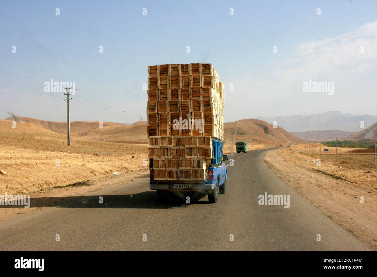 A fully loaded pickup truck in the Kurdish region not far from the ...