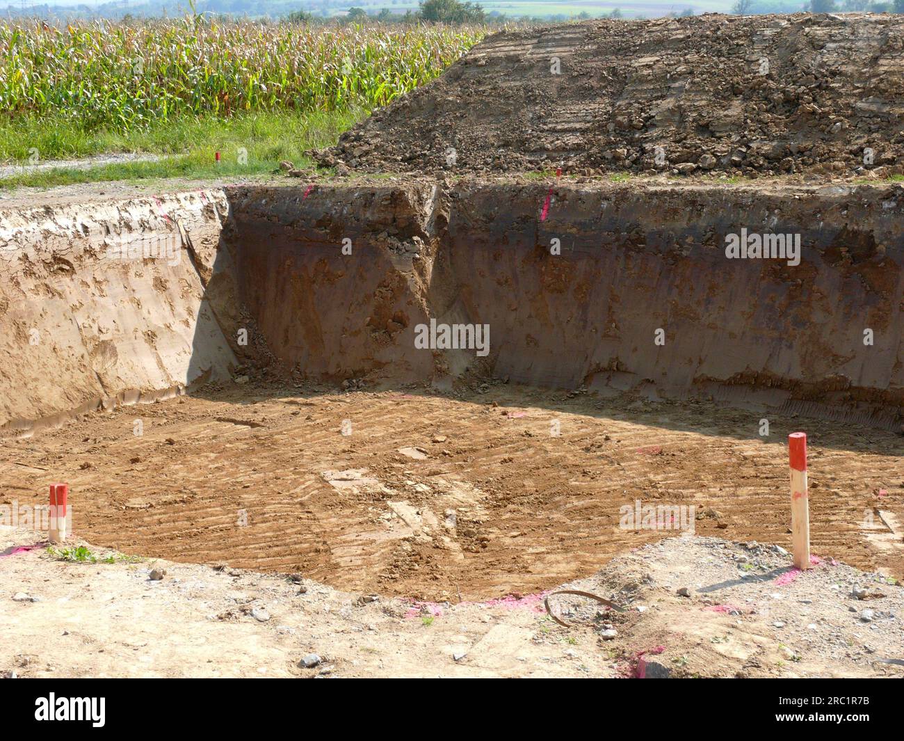 Multi-family house construction site, freshly excavated building pit ...