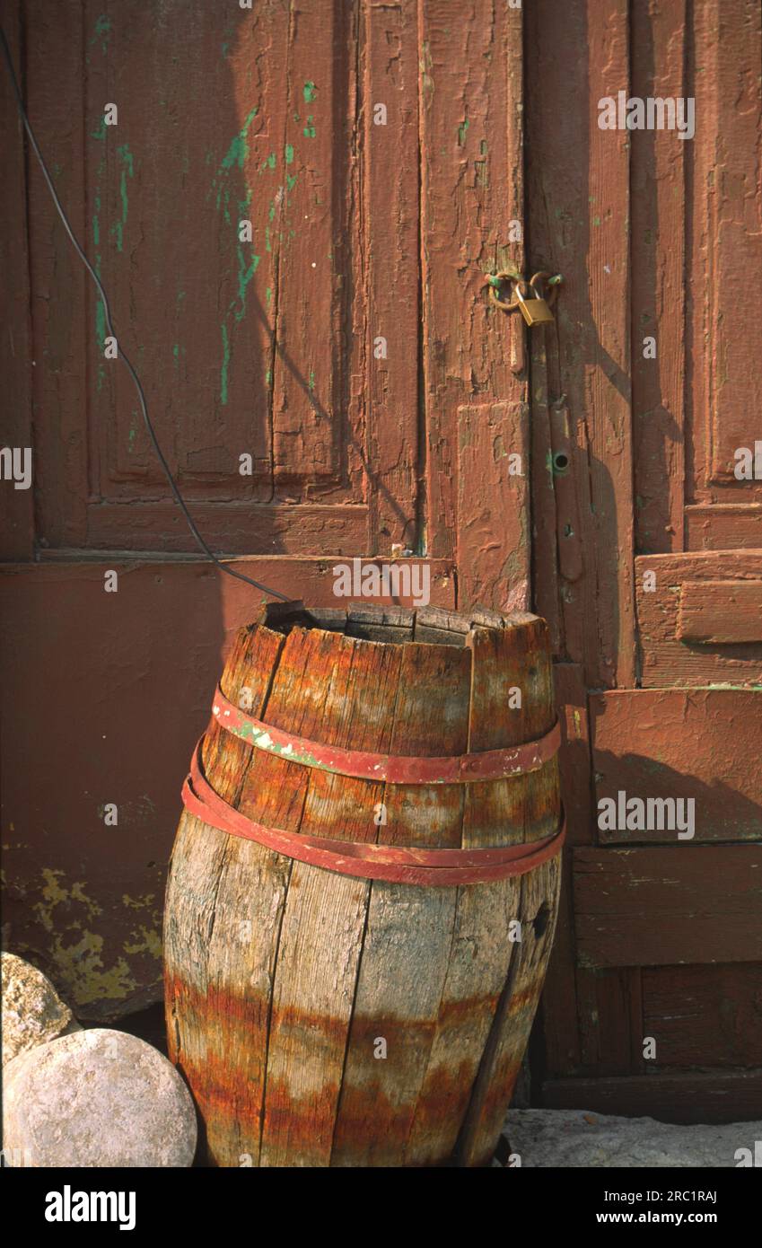 Wine barrel, door, grate Stock Photo - Alamy