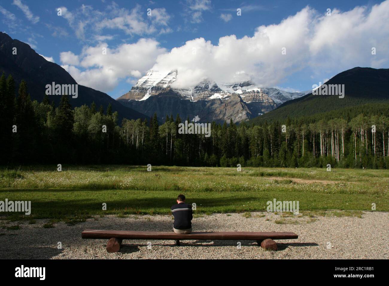 Tourist at Mount Robson, the highest peak of the Canadian Rocky ...