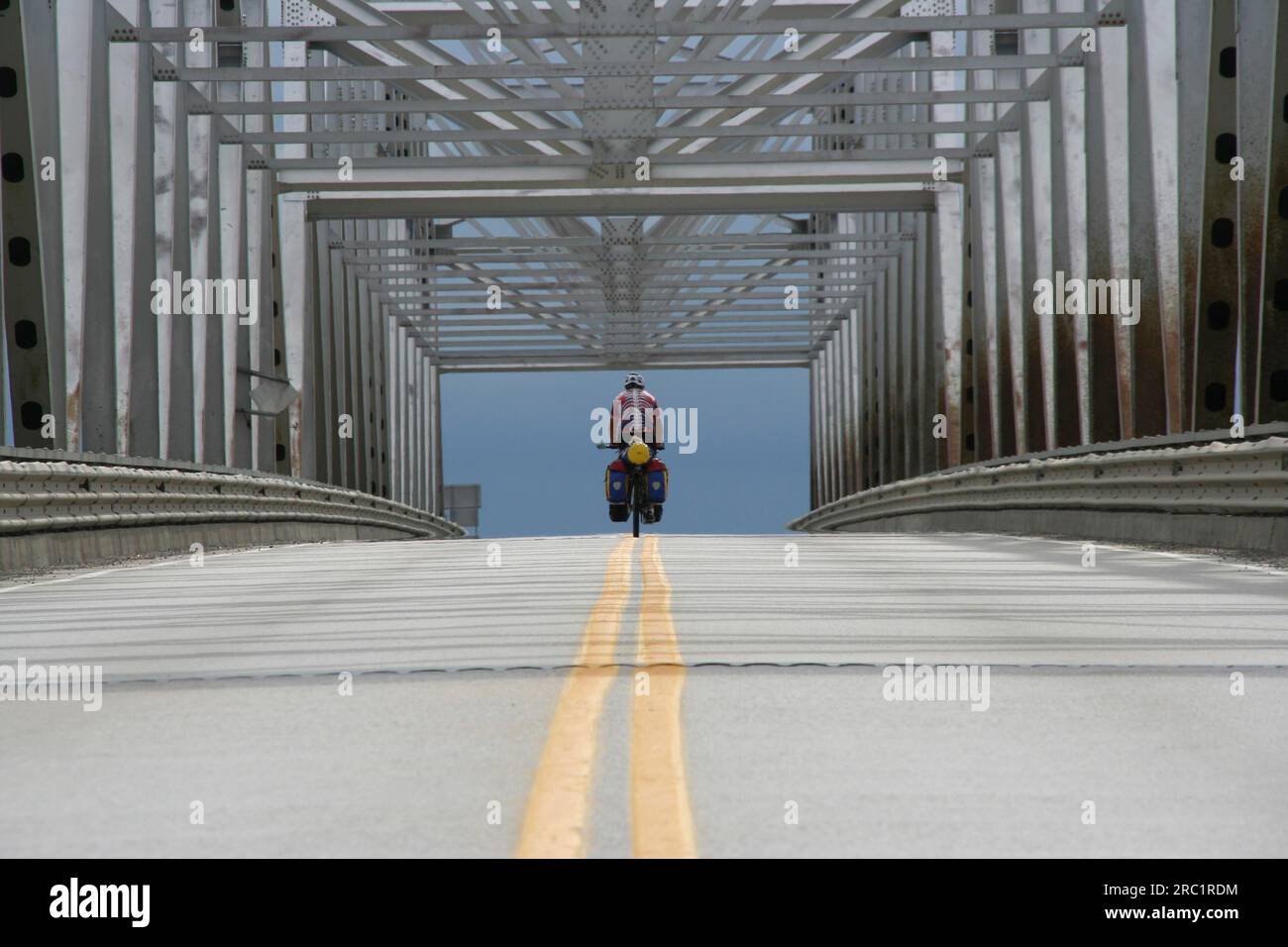 Person crossing steel bridge hi-res stock photography and images - Alamy